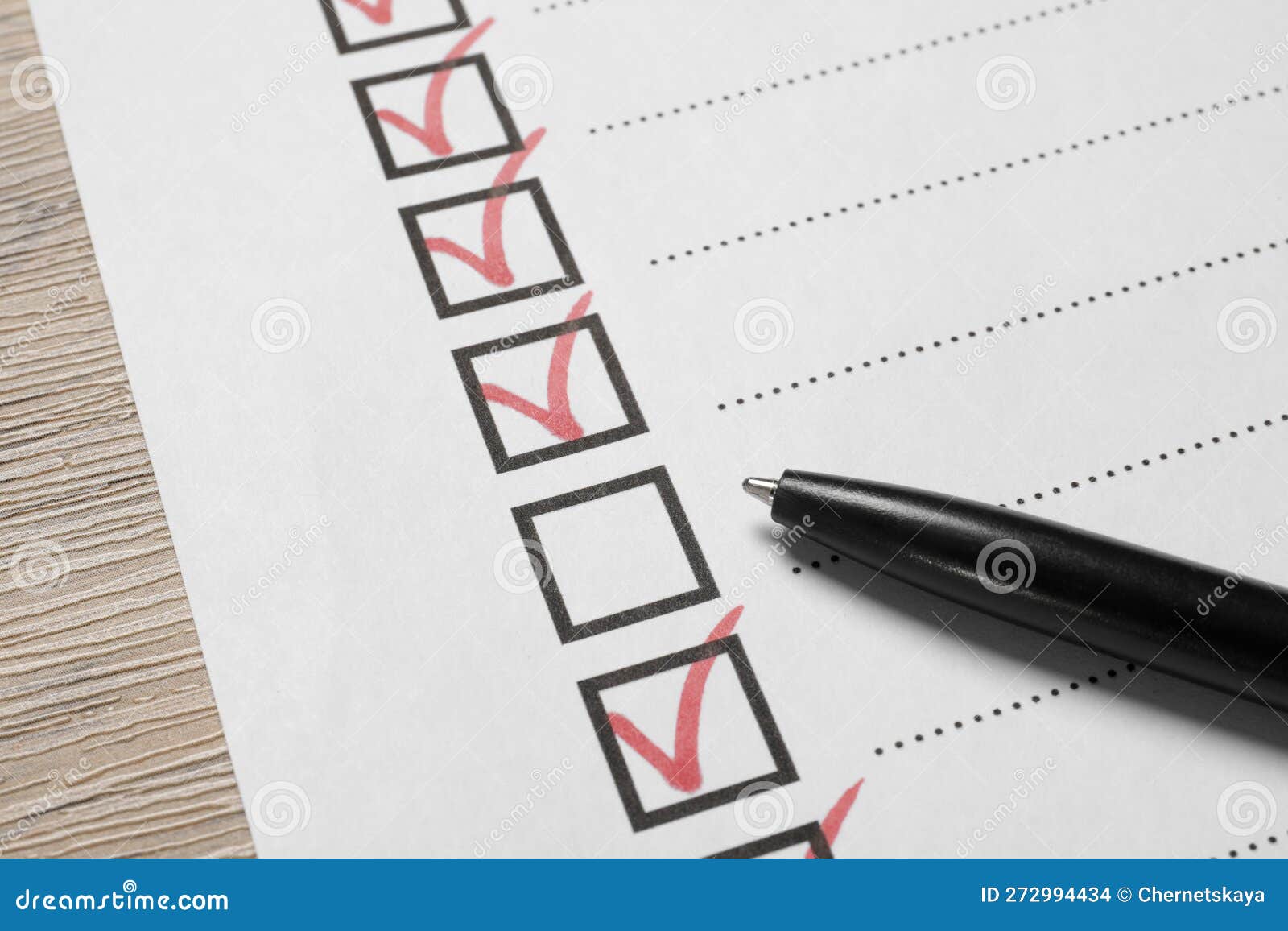 Paper Sheet with Checkboxes and Pen on Wooden Table, Closeup. Checklist ...
