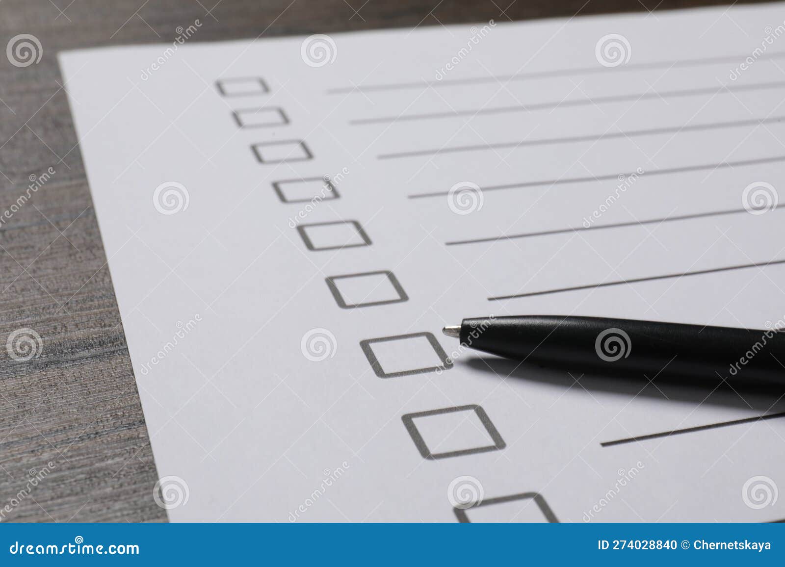 Paper Sheet with Checkboxes and Pen on Wooden Table, Closeup. Checklist ...
