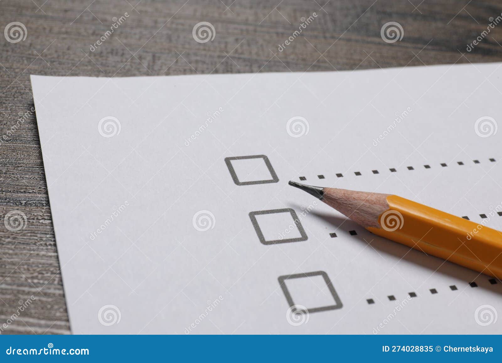 Paper Sheet with Checkboxes and Pencil on Wooden Table, Closeup ...