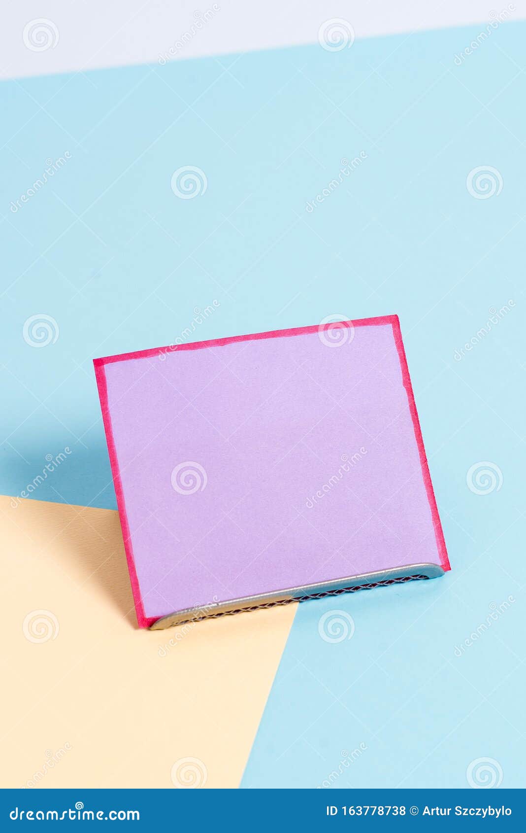 Paper Sheet Placed Tilted on a Buffer Wire with a Soft Pastel Backdrop ...