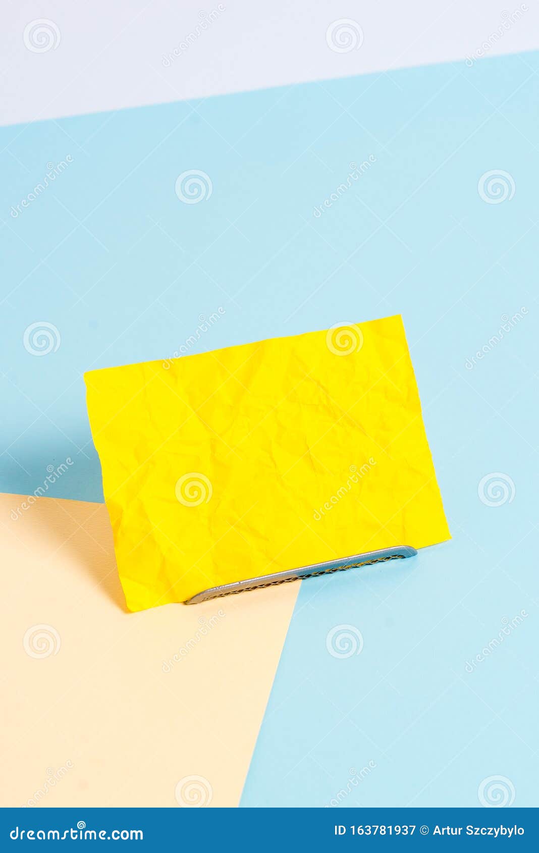 Paper Sheet Placed Tilted on a Buffer Wire with a Soft Pastel Backdrop ...