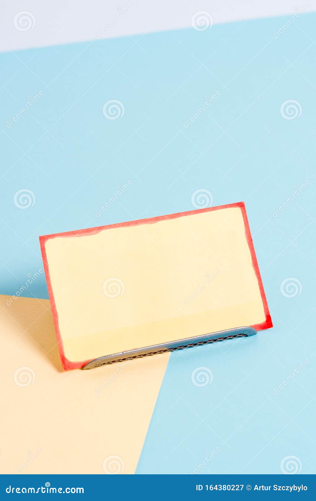 Paper Sheet Placed Tilted on a Buffer Wire with a Soft Pastel Backdrop ...