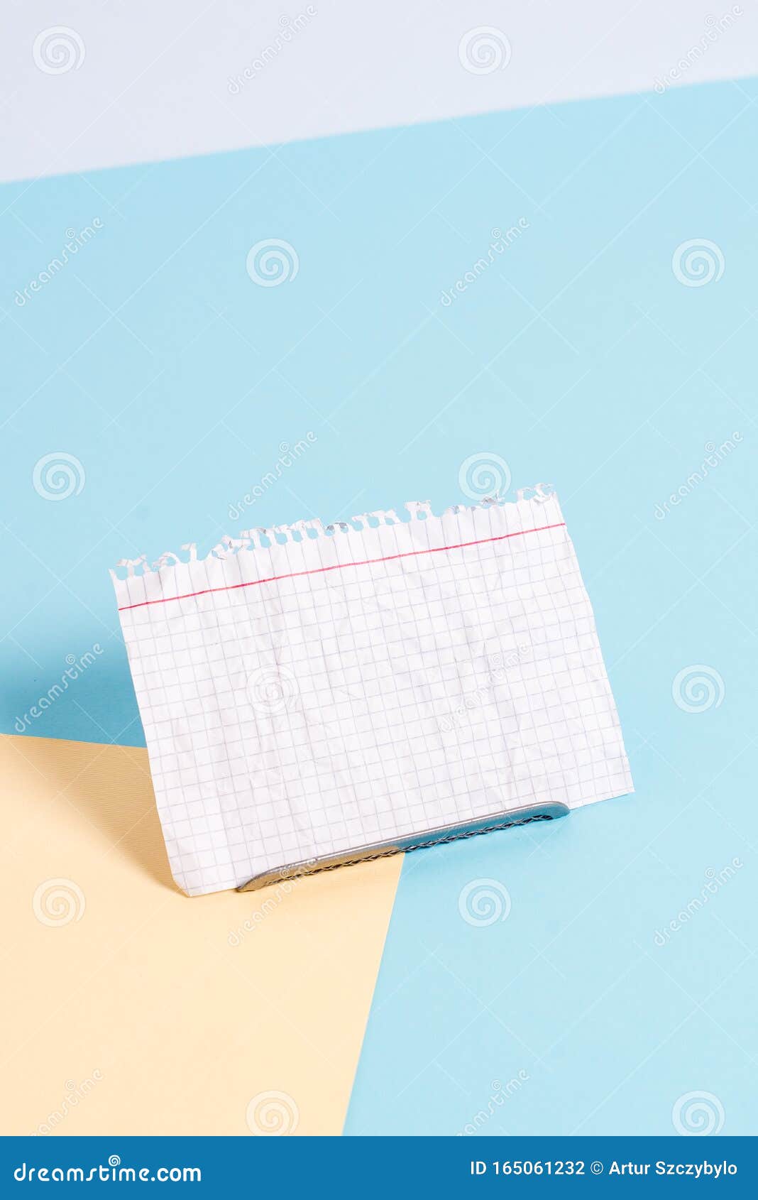 Paper Sheet Placed Tilted on a Buffer Wire with a Soft Pastel Backdrop ...