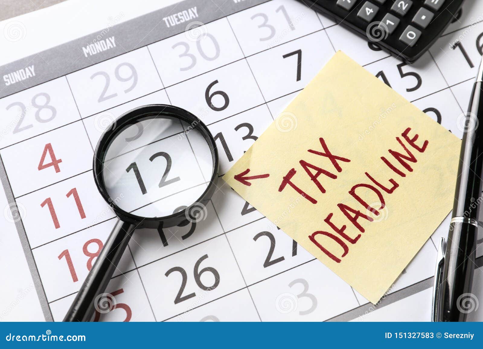 Paper Sheet with Text TAX DEADLINE and Magnifying Glass on Calendar ... Paper Sheet with Text TAX DEADLINE and Magnifying Glass on Calendar ...