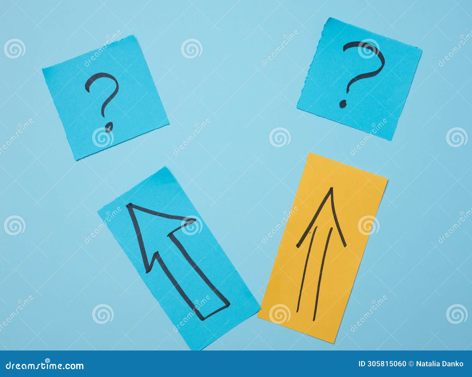 Paper Sheets with Drawn Arrows and Question Marks, Embodying the ...
