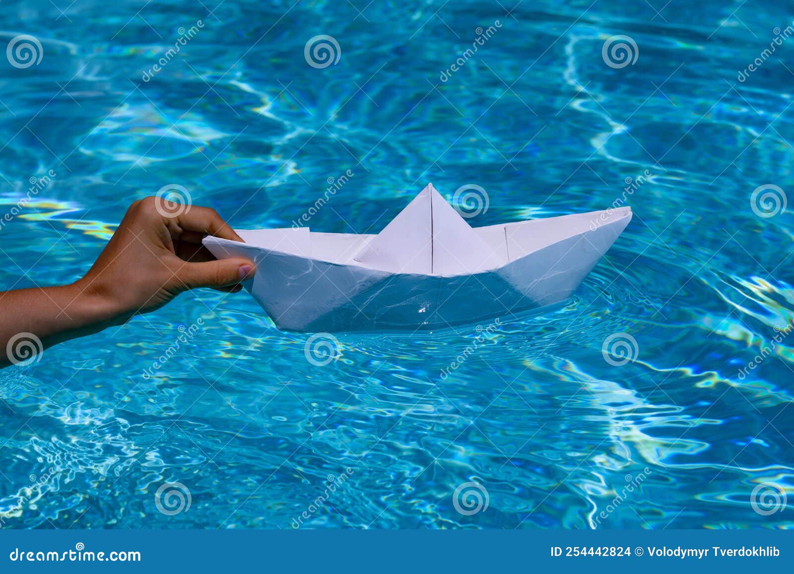 Paper Ship in Hand. Hand and Paper Boat. Origami Paper Boat. Stock ...