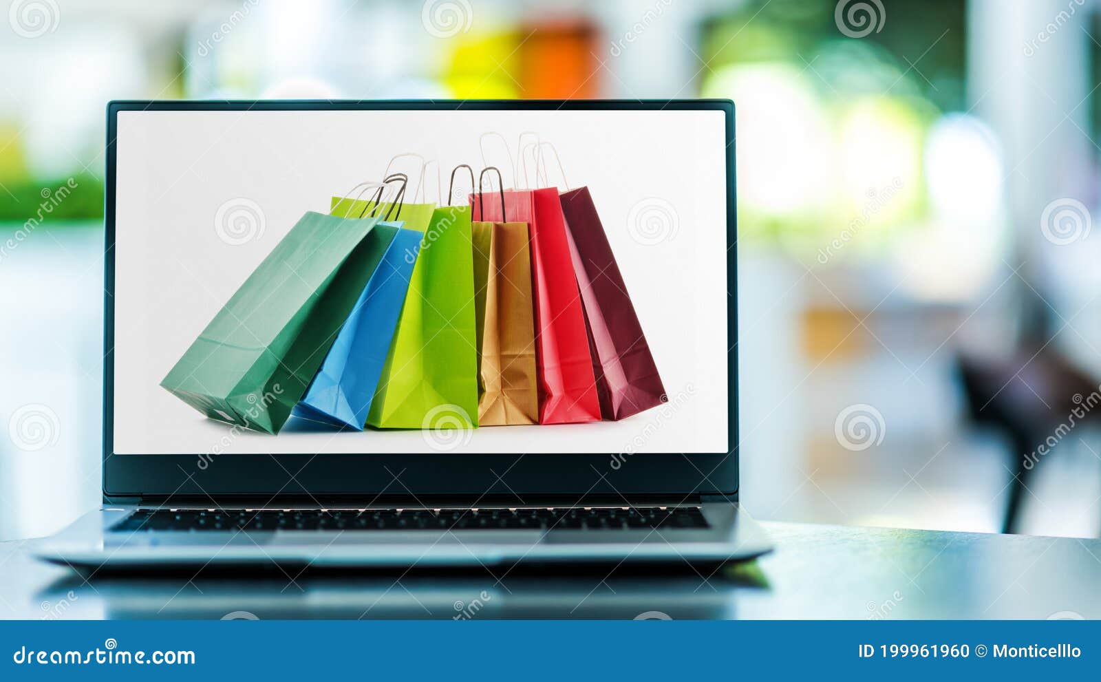 Paper Shopping Bags on Laptop Computer Screen. Shopping Online Stock ...