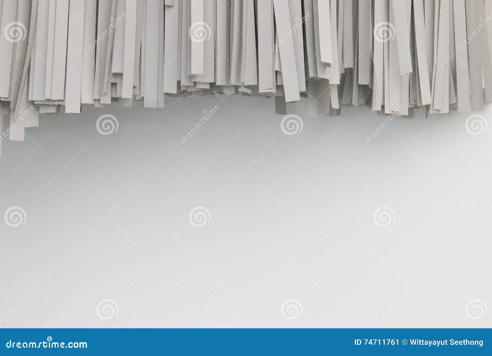 Paper Shredded on White Background. Paper Shredder Hang on White Wall ...