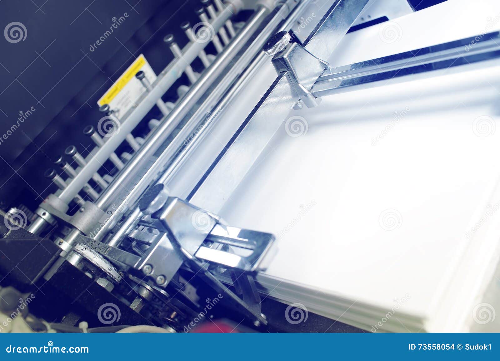 Paper Stack in Bin of Offset Printing Press Stock Photo - Image of ...
