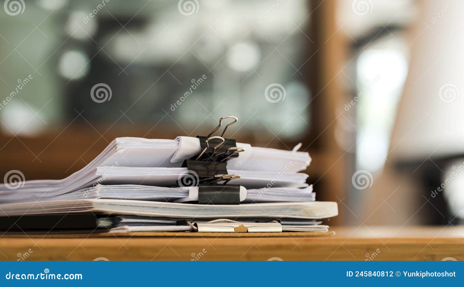 Paper Stack on the Desk Related To Business Functions Stock Photo ...