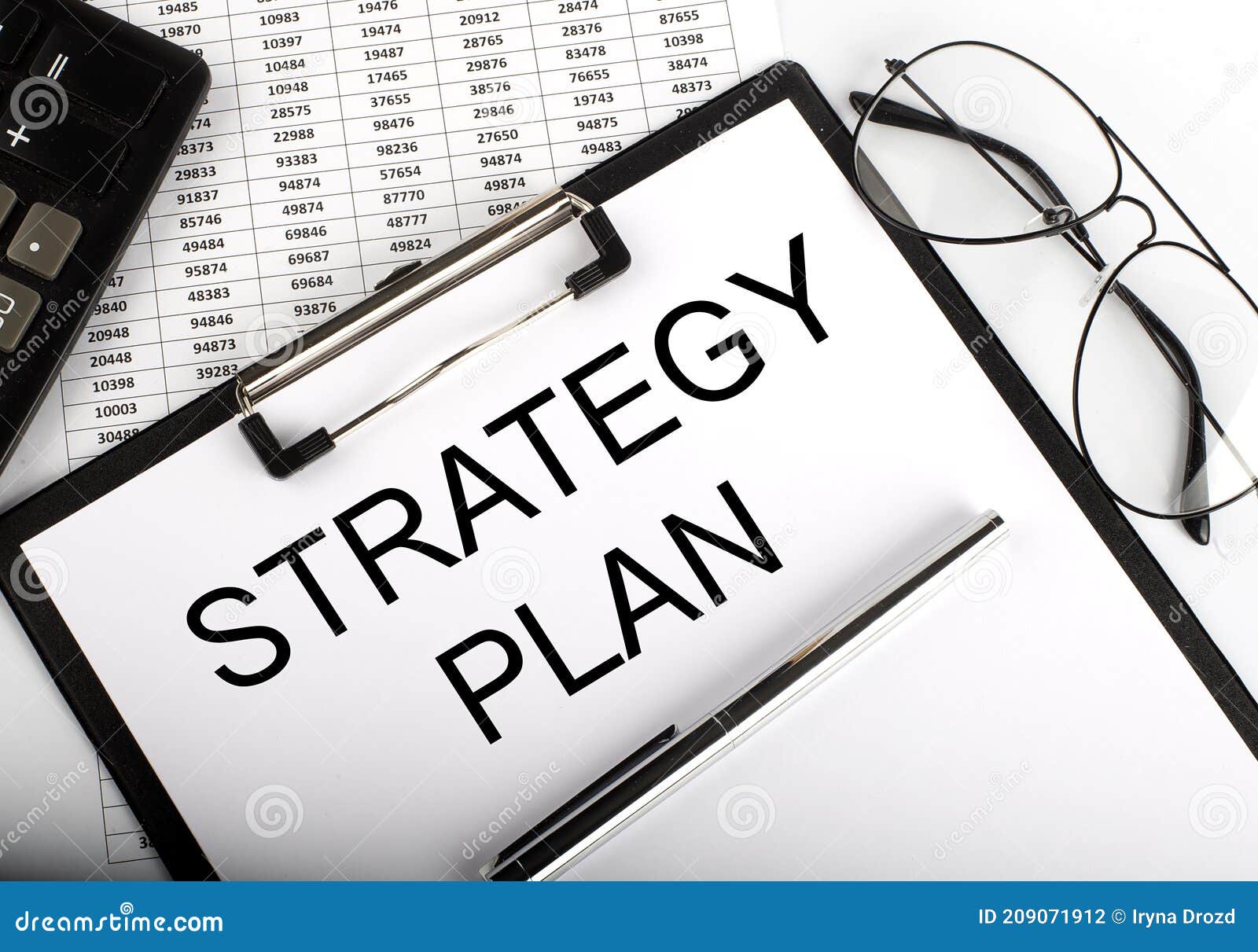 Paper with STRATEGY PLAN on a Table with Chart Stock Photo - Image of ...