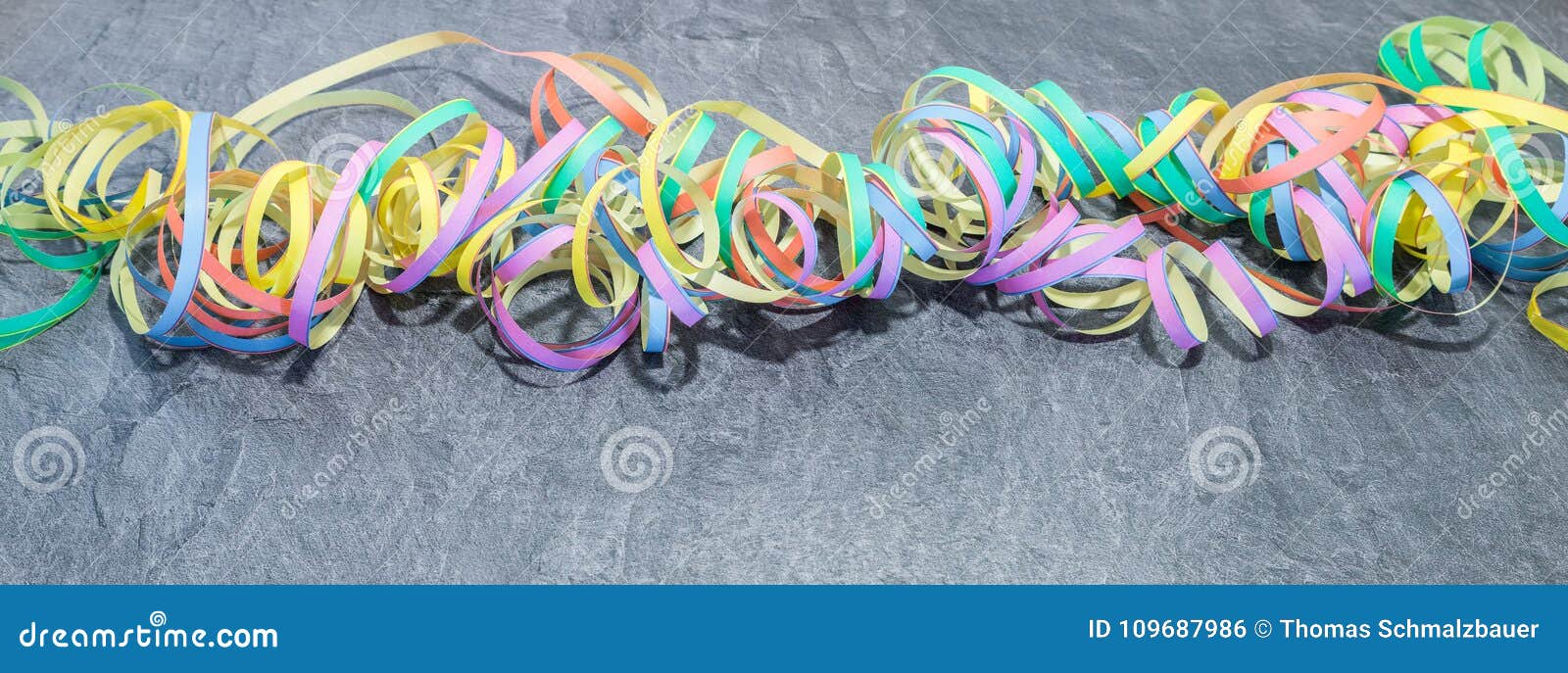Paper Streamer As Carnival Decoration on a Slate Stock Photo - Image of ...