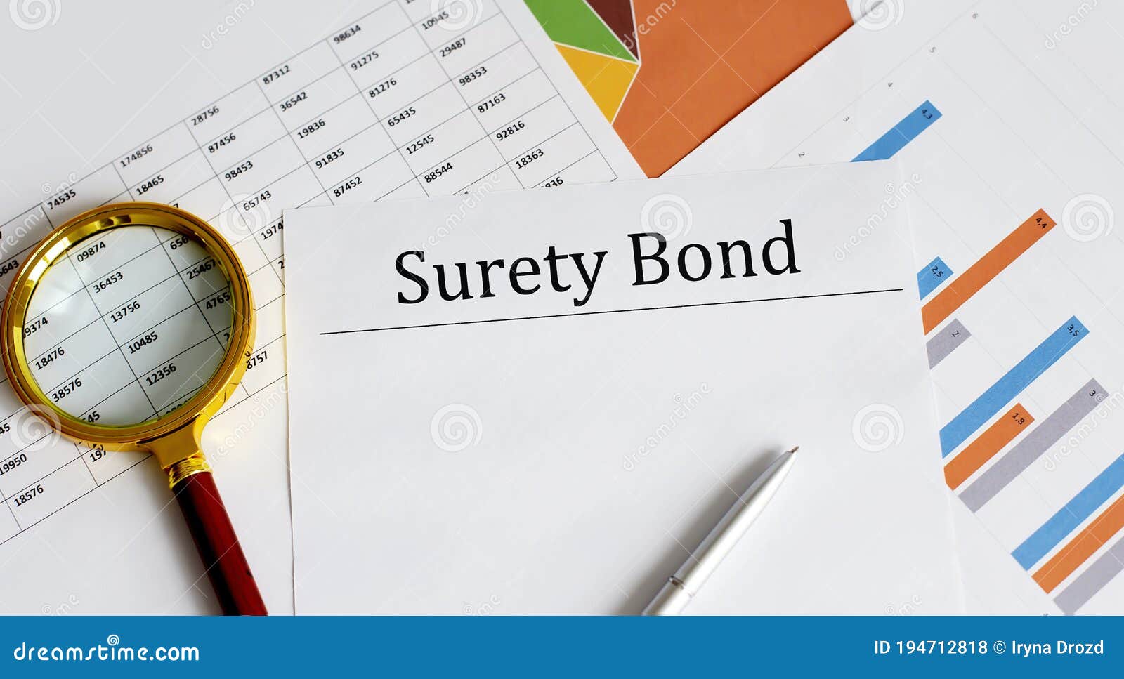 Paper with Surety Bond on a Table with Pen, Chart and Magnifier Stock ...