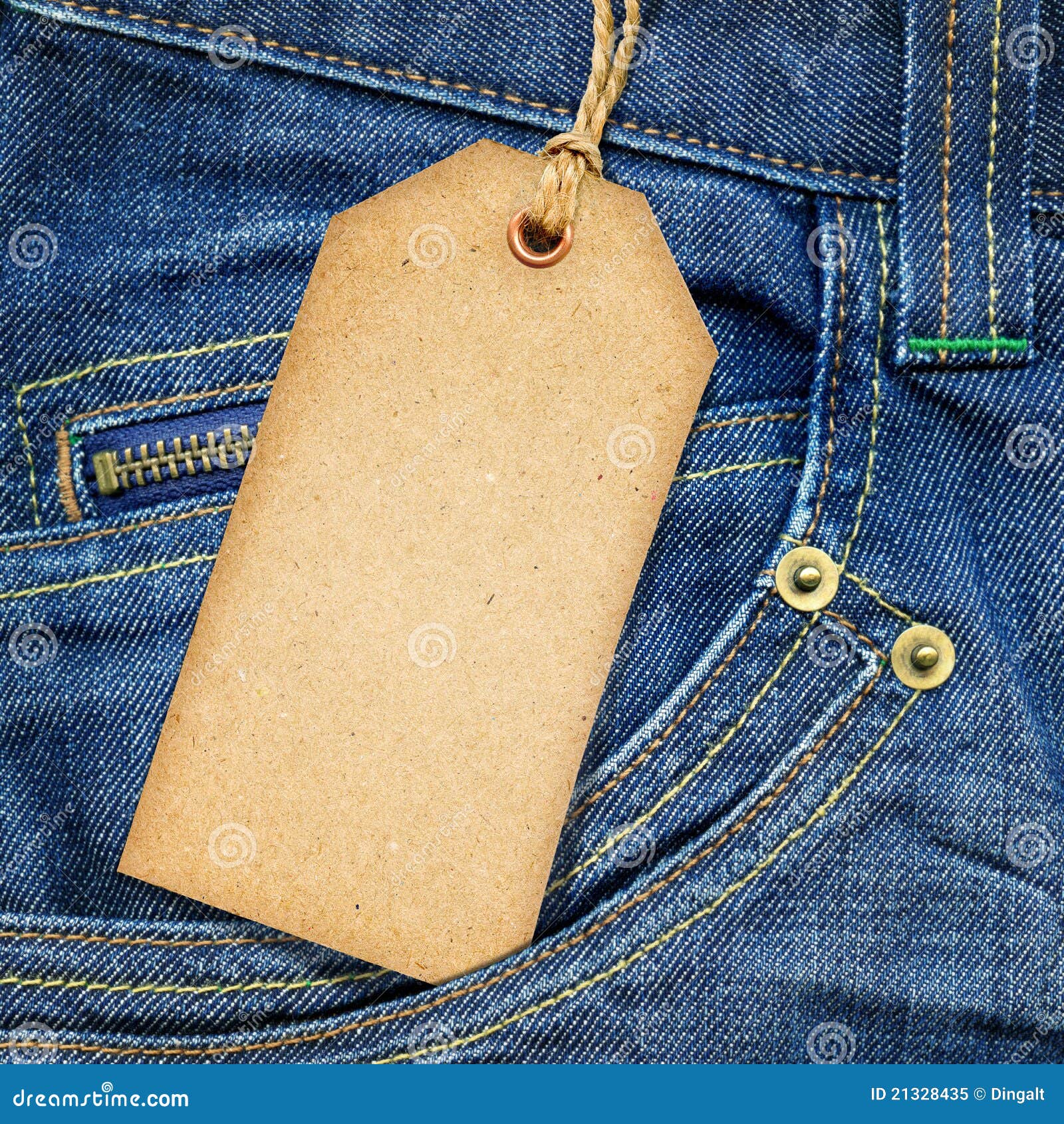 Paper tag on blue denim stock image. Image of background - 21328435