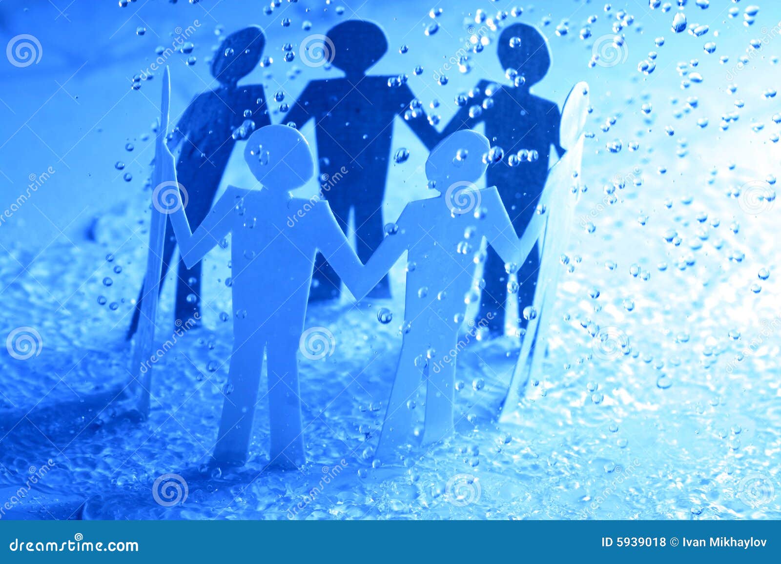 Paper team under rain stock photo. Image of cooperative - 5939018