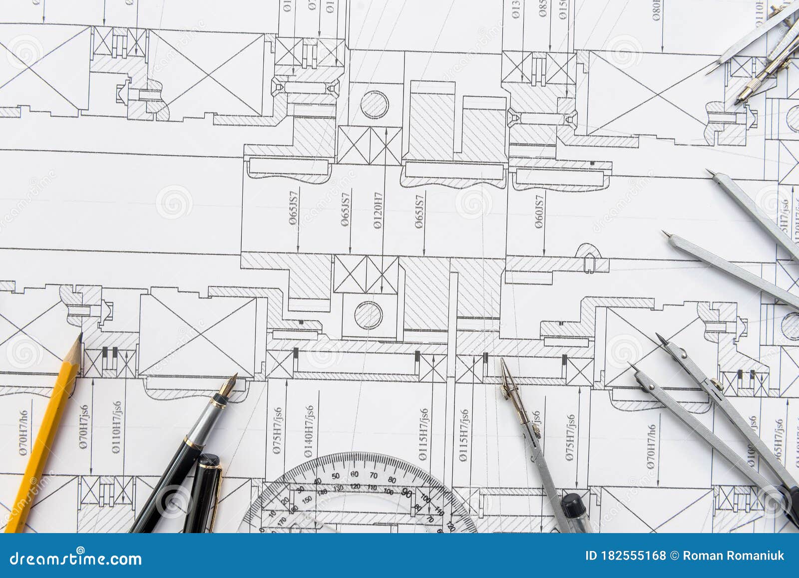 Paper with Technical Drawings and Work Tool on Table. Place of Work ...