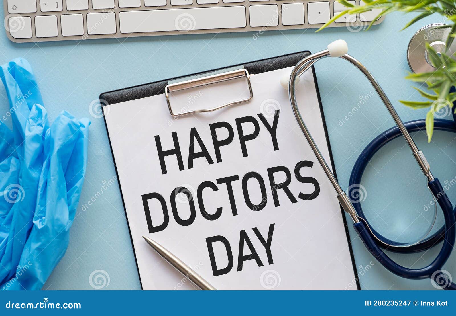 Paper with Text HAPPY DOCTORS DAY and Stethoscope on Beige Background ...