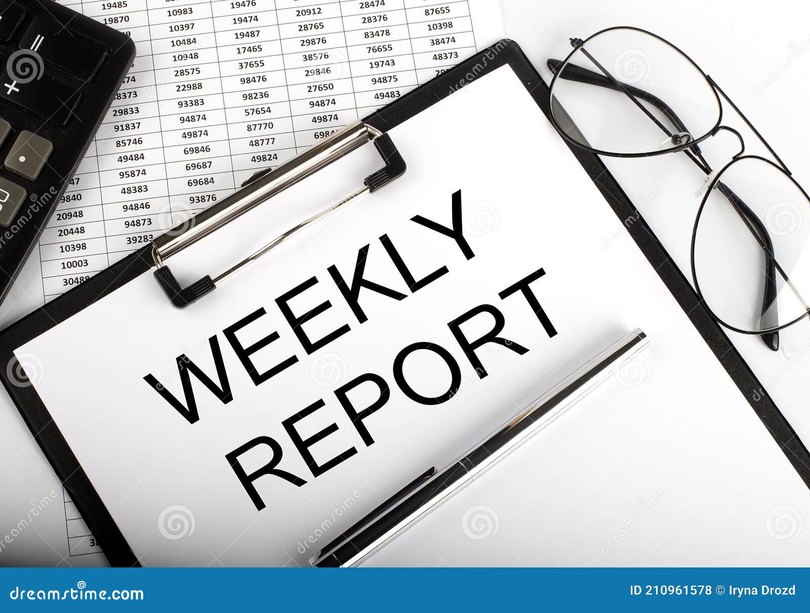 Paper with Text Weekly Report on the Table on the Chart Stock Photo ...