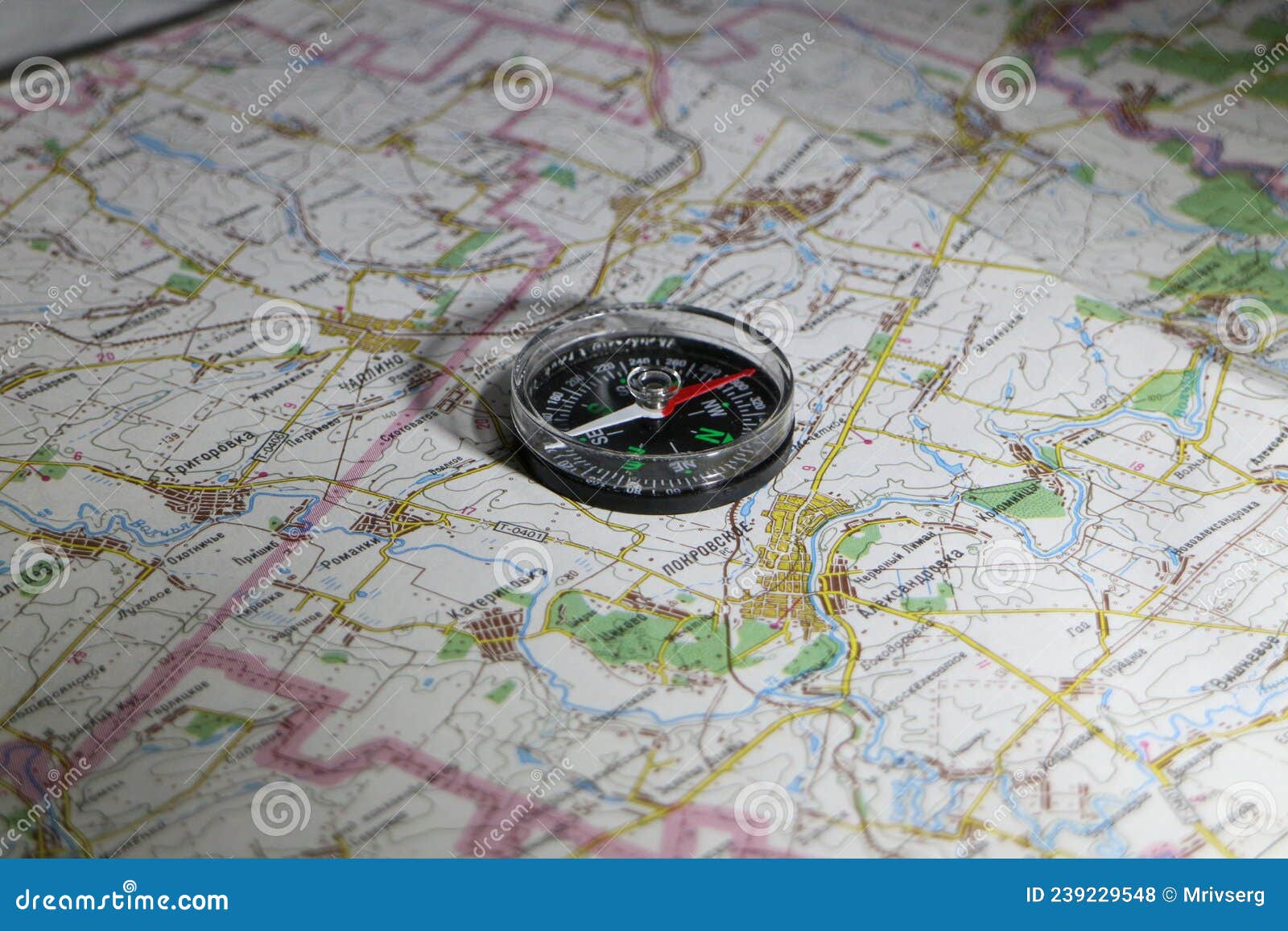Paper Topographic Map and Magnetic Compass Stock Photo - Image of ...