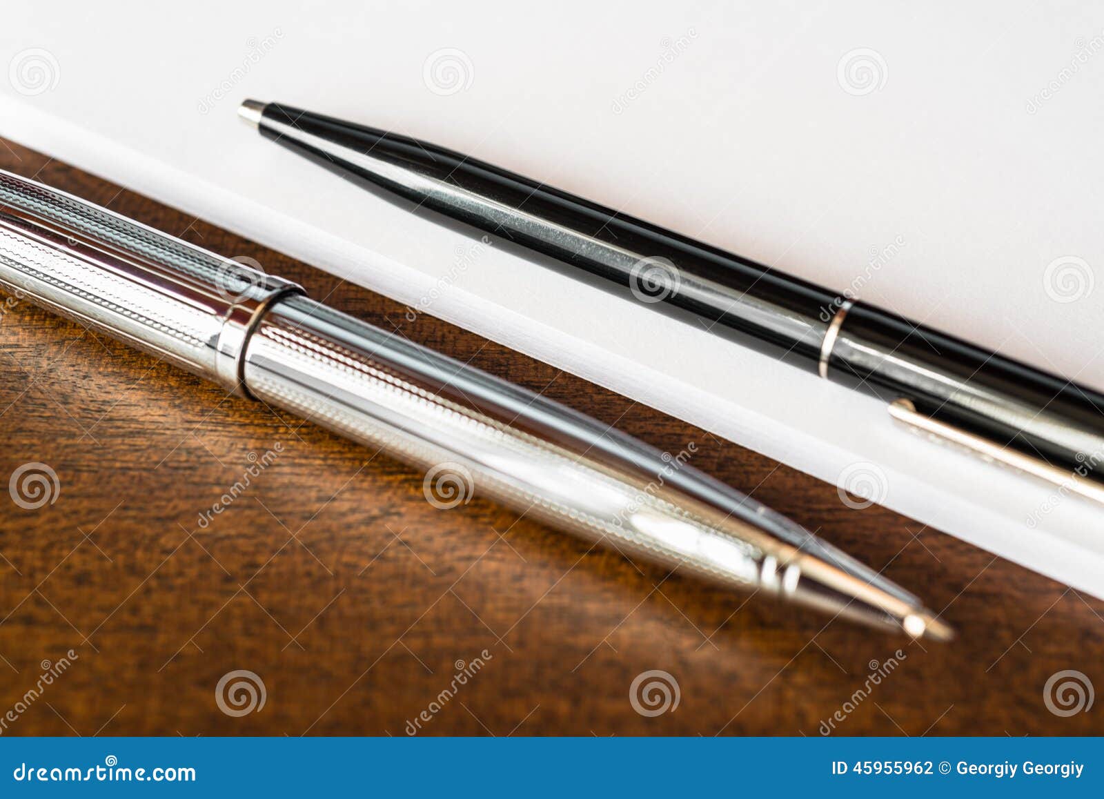 Paper and Two Pens on the Table Stock Photo - Image of idea, meetings ...