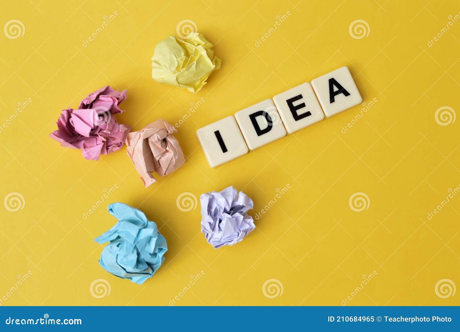 Paper Waste and Scrabble Letters with Text IDEA Over Yellow Background ...