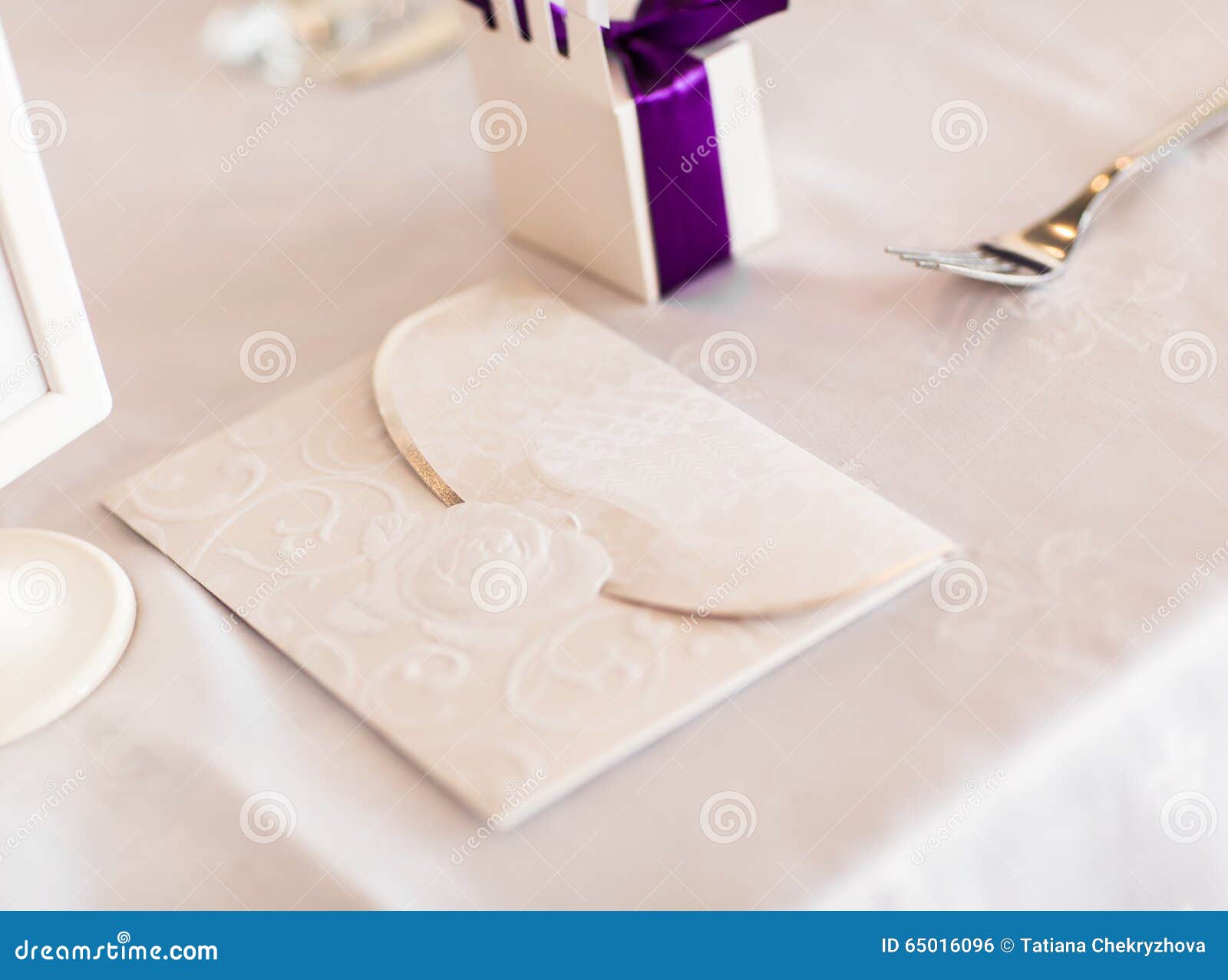 Paper Wedding Invitation on the Table Stock Photo - Image of invitation ...