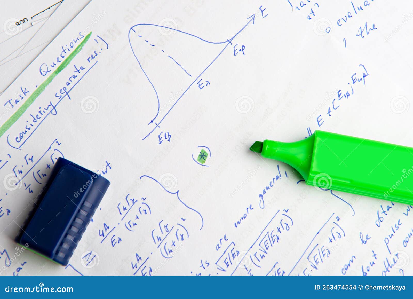 Paper with Written Mathematical Calculations and Green Highlighter, Top ...