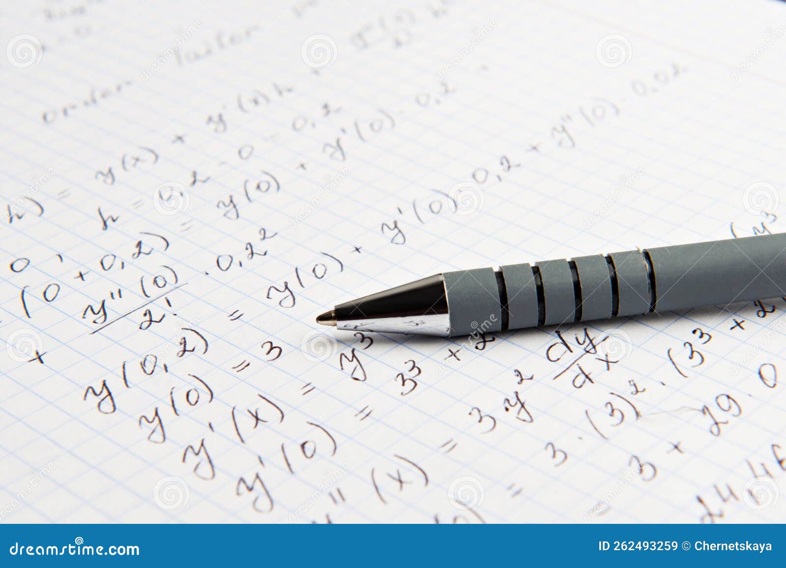 Paper with Written Mathematical Calculations and Pen, Closeup Stock ...