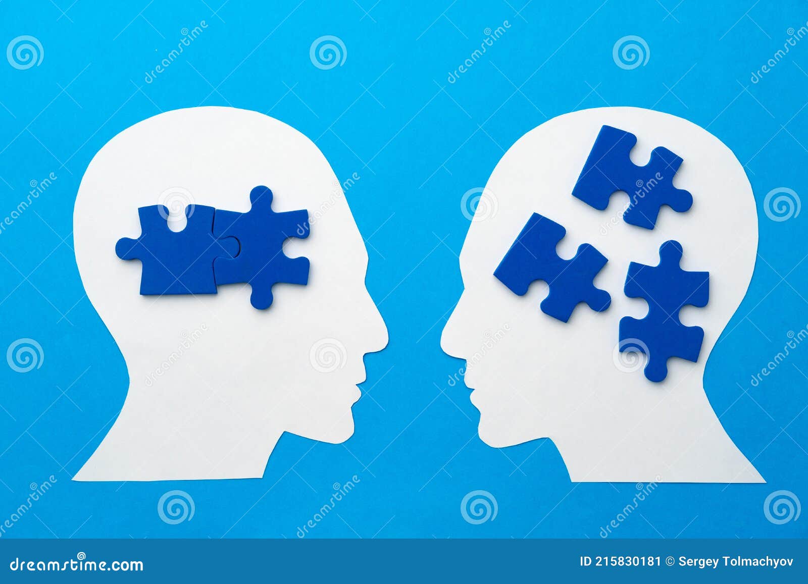 Papercut Head with Jigsaw Puzzle Pieces on Blue Background Stock Image ...