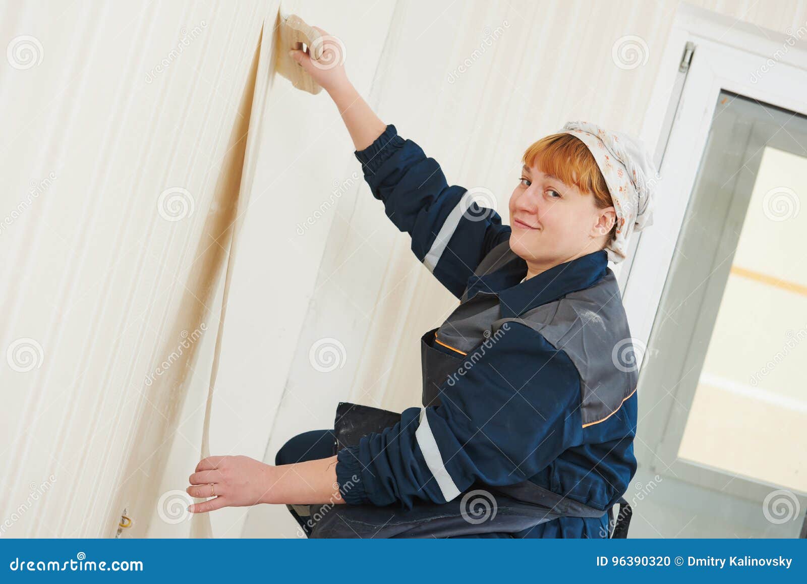 Papering Wall by Wallpaper during Renovation Stock Photo - Image of ...