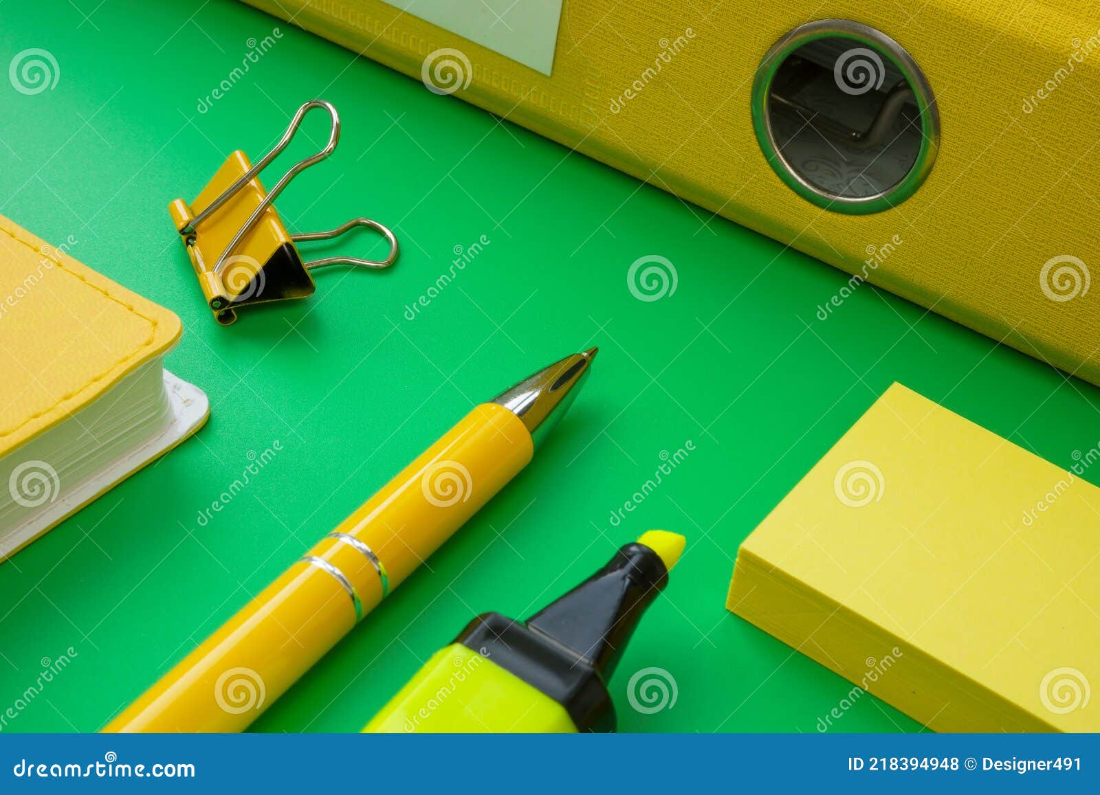 Paperwork and Office Supplies Concept. Green and Yellow Folder with ...