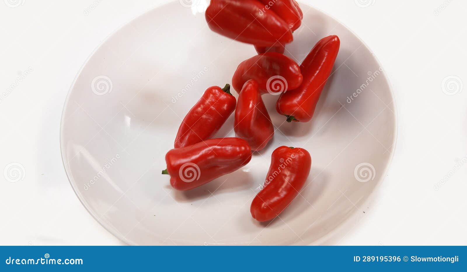 Paprika, Capsicum Annuum, Falling Against White Background Stock Photo ...