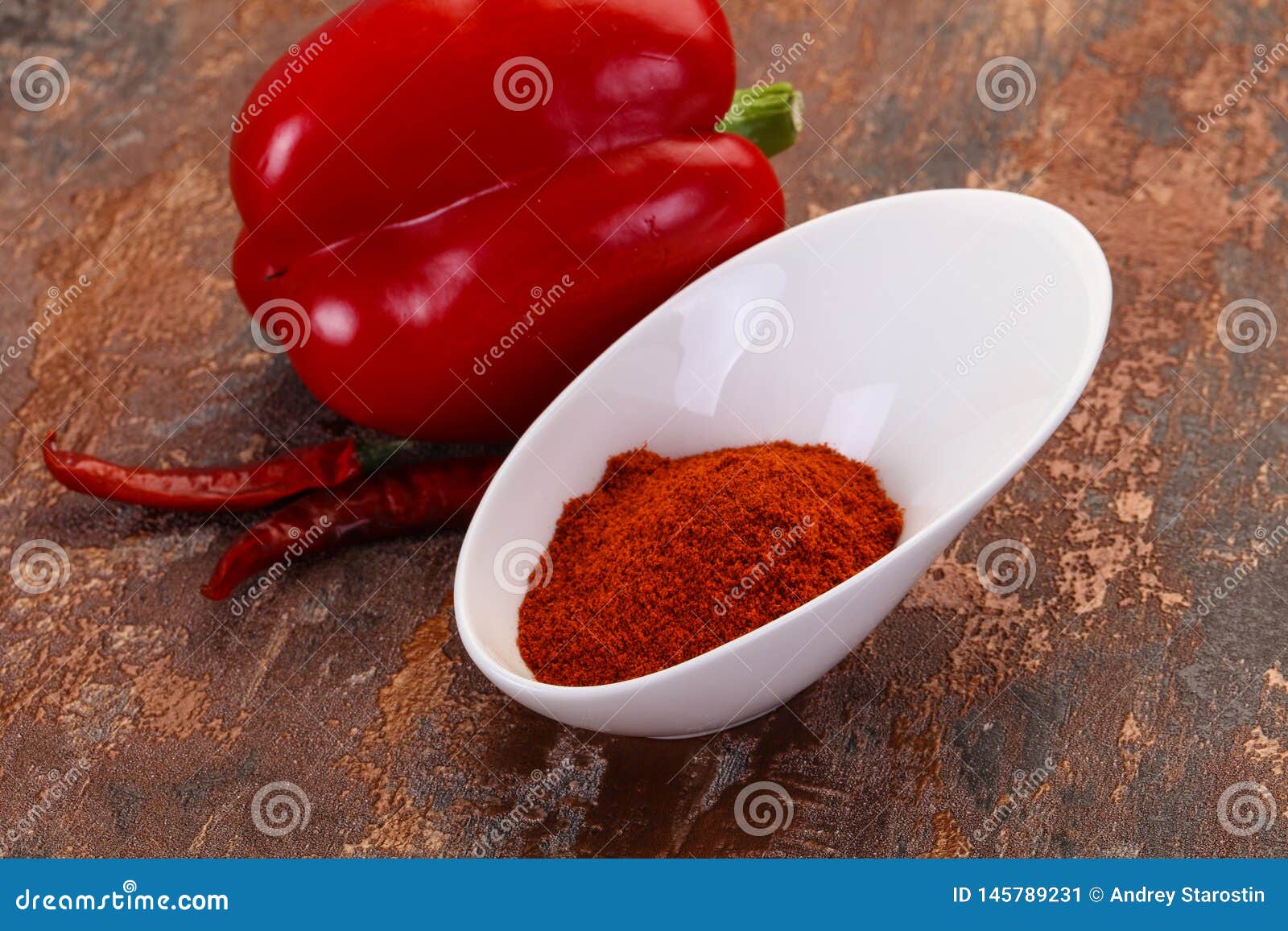 Paprika powder in the bowl stock image. Image of fresh - 145789231