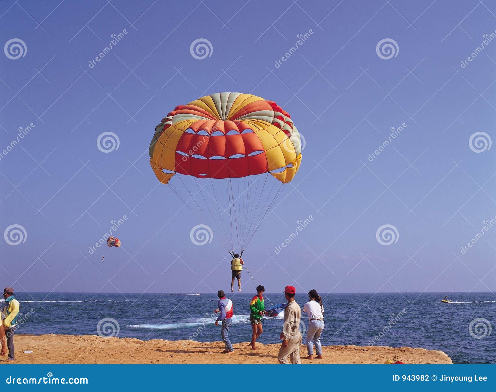 Parachute above Sea stock photo. Image of green, goggle - 943982