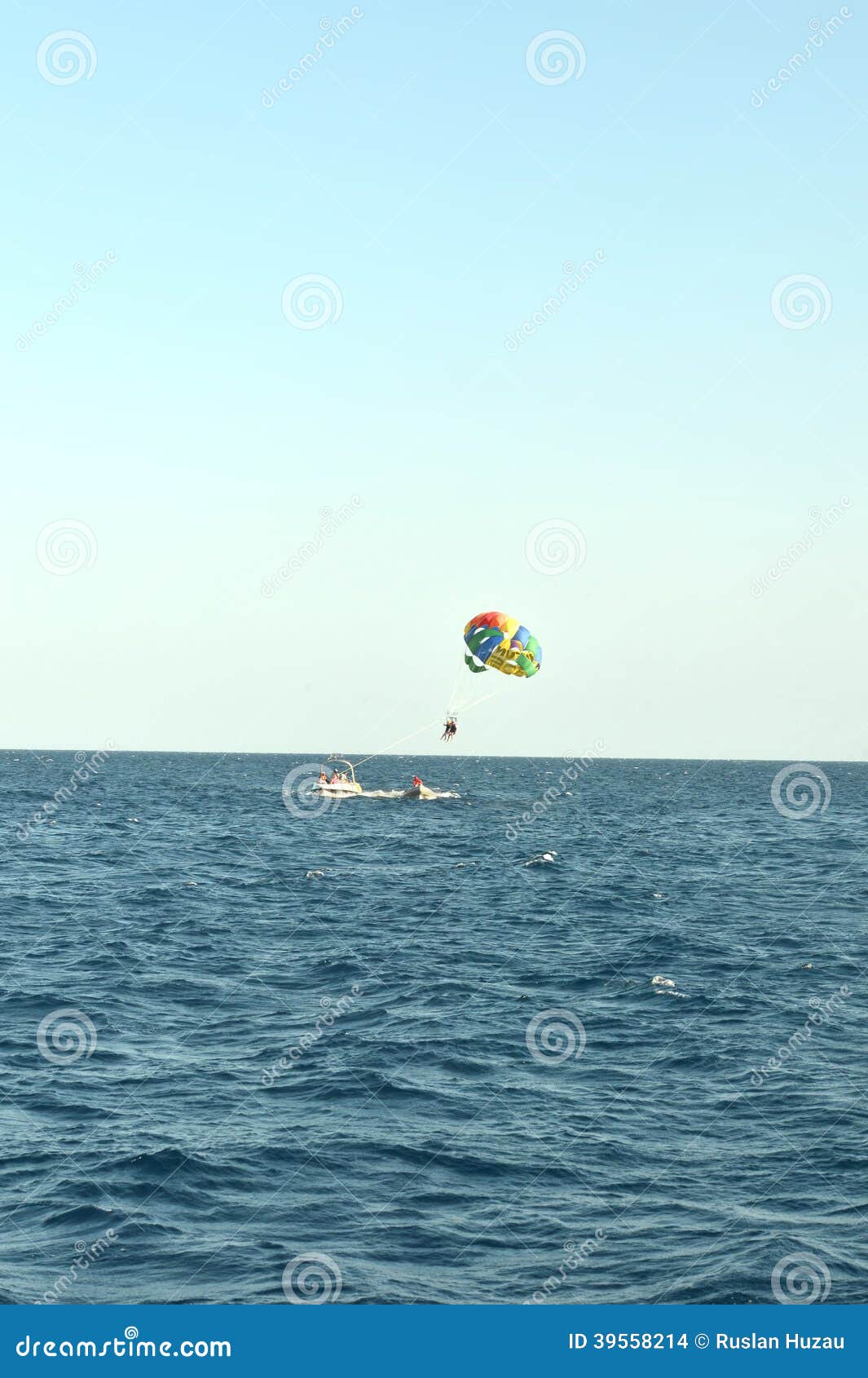 Parachute on blue sea stock photo. Image of freedom, fast - 39558214