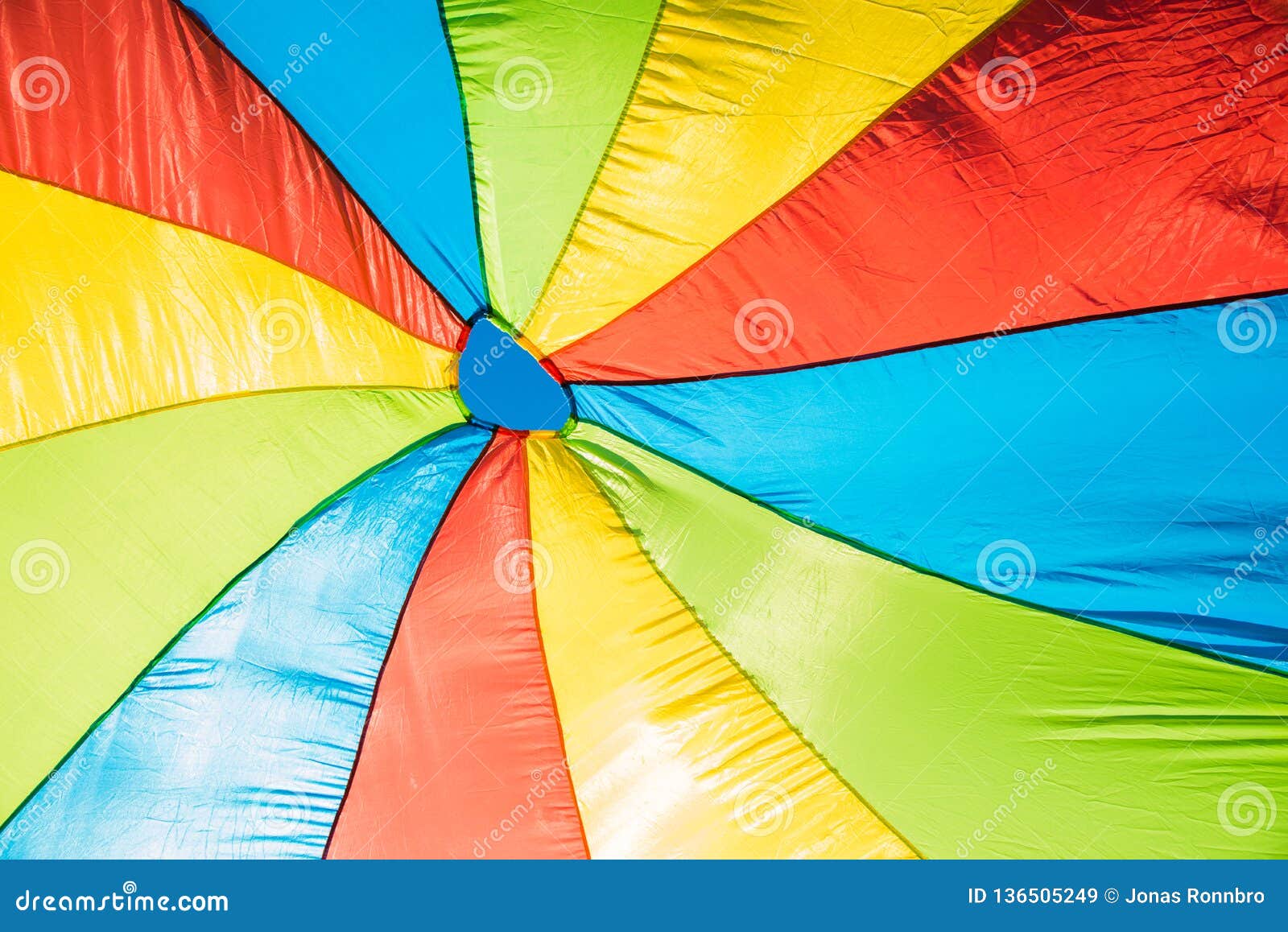 A parachute in many colors stock image. Image of blue - 136505249