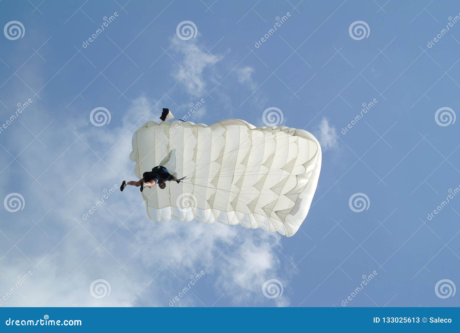 Parachuter with White Parachute on Parachuting Cup Seen from Below ...
