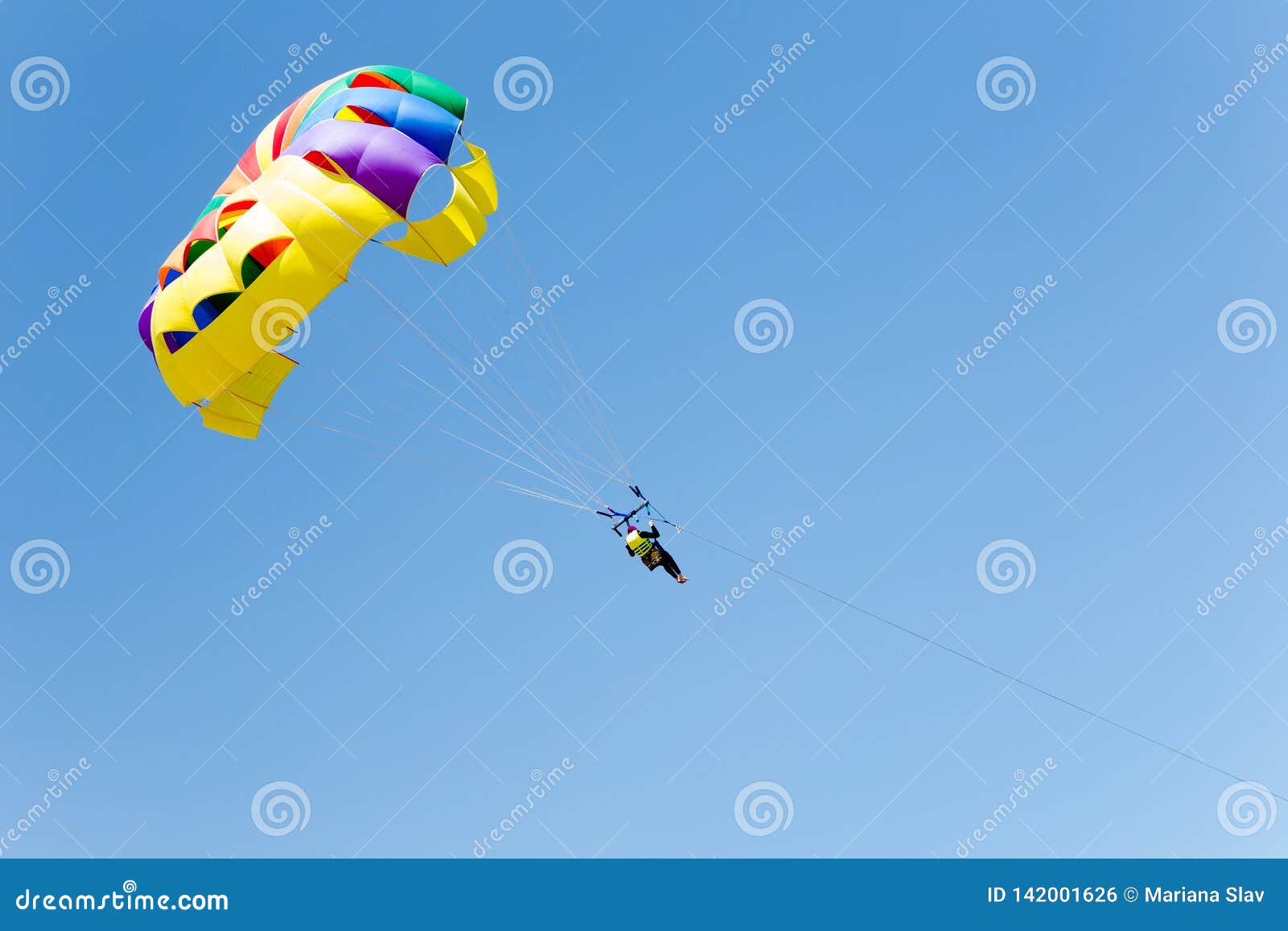 Parachuting Above the Sea, Skydiver Stock Photo - Image of colored ...
