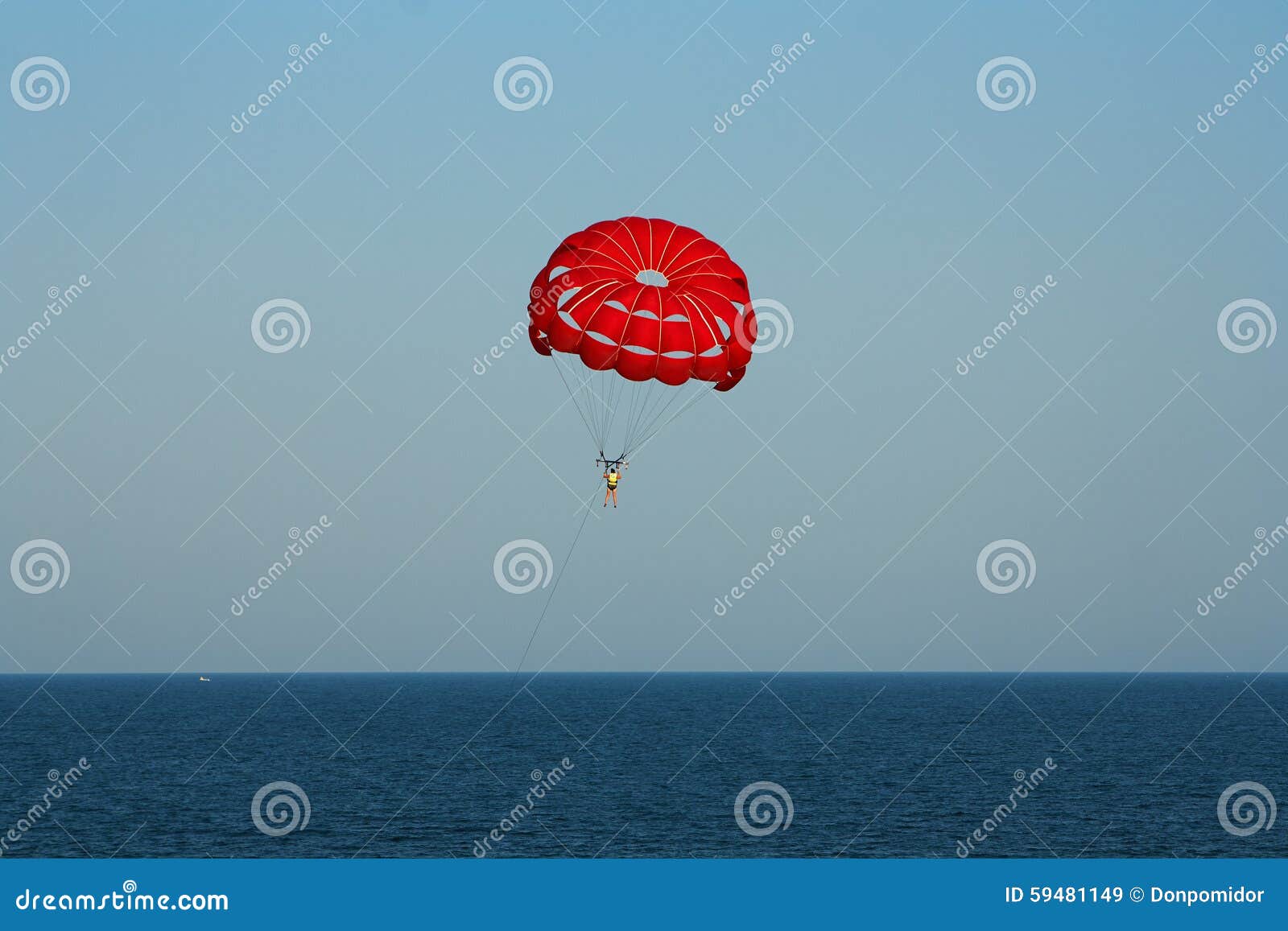 Parachuting at sea stock image. Image of flying, activity - 59481149