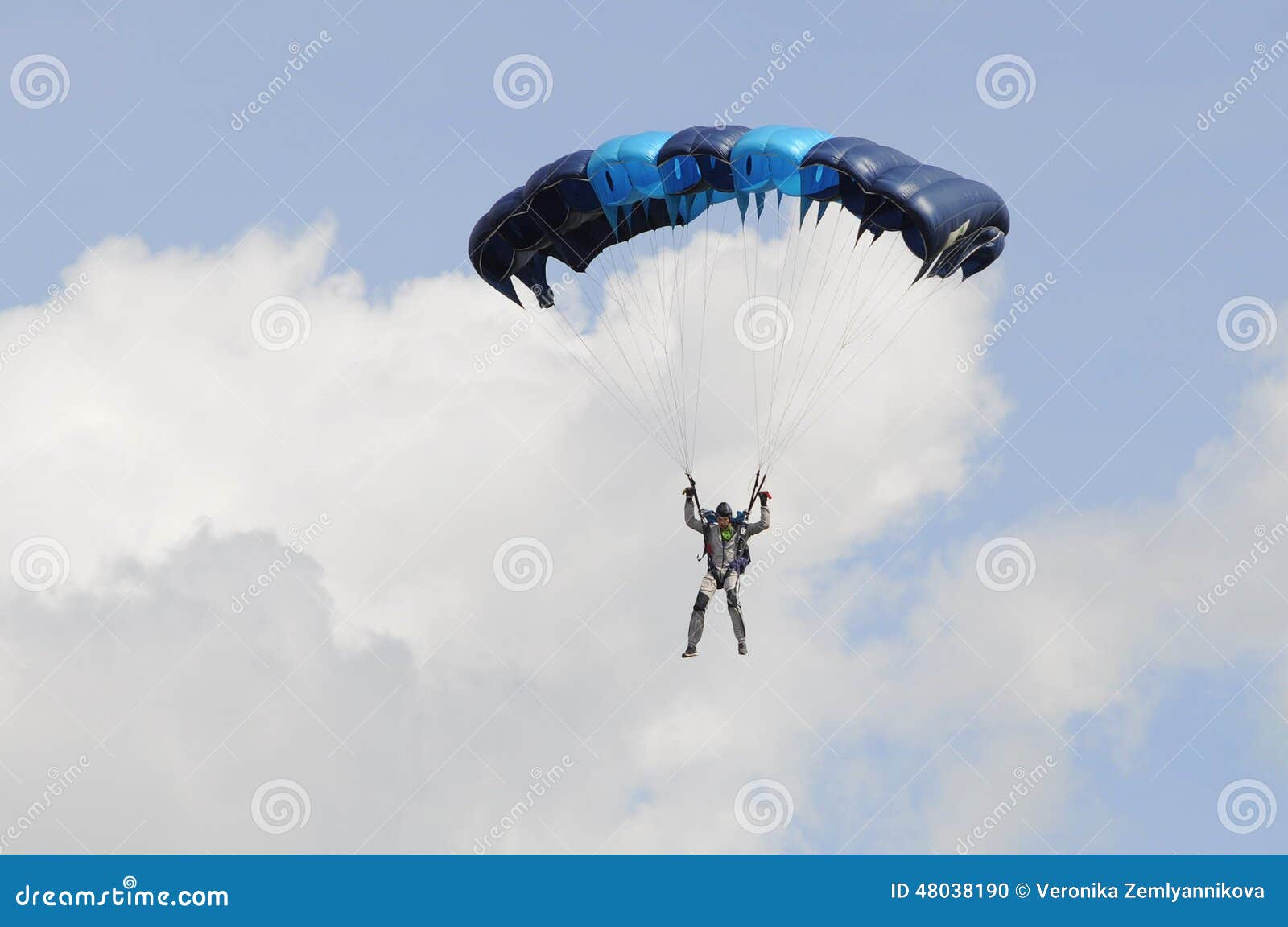The Parachutist Goes Down on a Multi-colored Parachute. Editorial Image ...