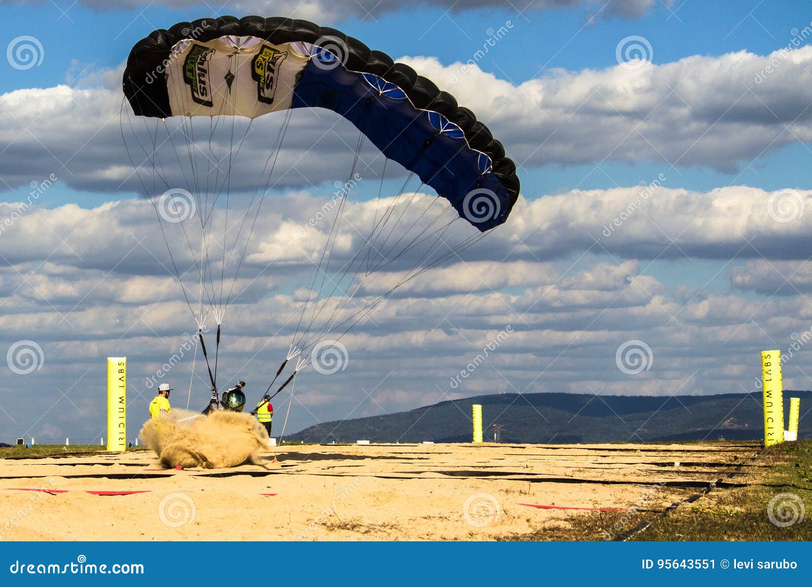 Parachutist Landing on the Sand Editorial Photo - Image of champion ...