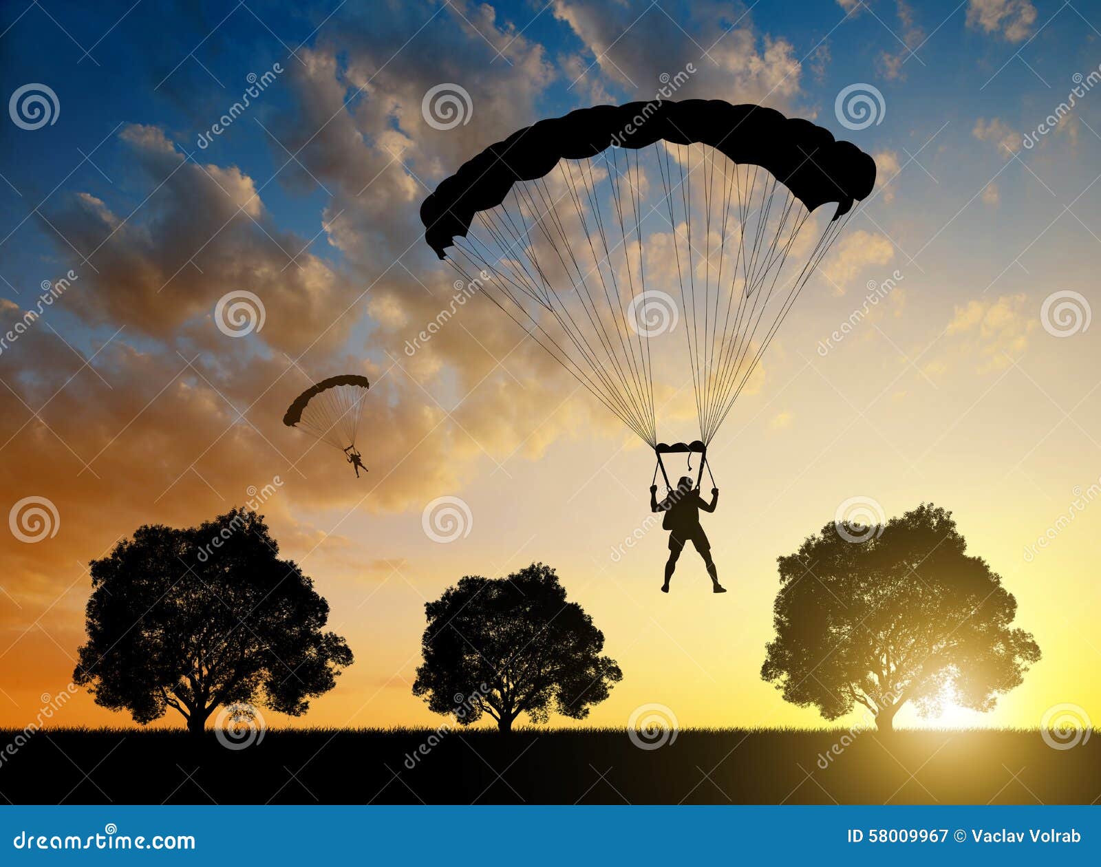 Parachutist Landing at Sunset Stock Image - Image of paragliding ...