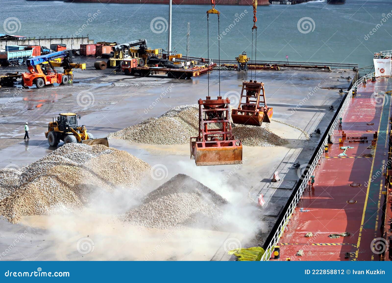 Unloading Bulk Cargo From Railway Wagons On Of High Railway Platform ...