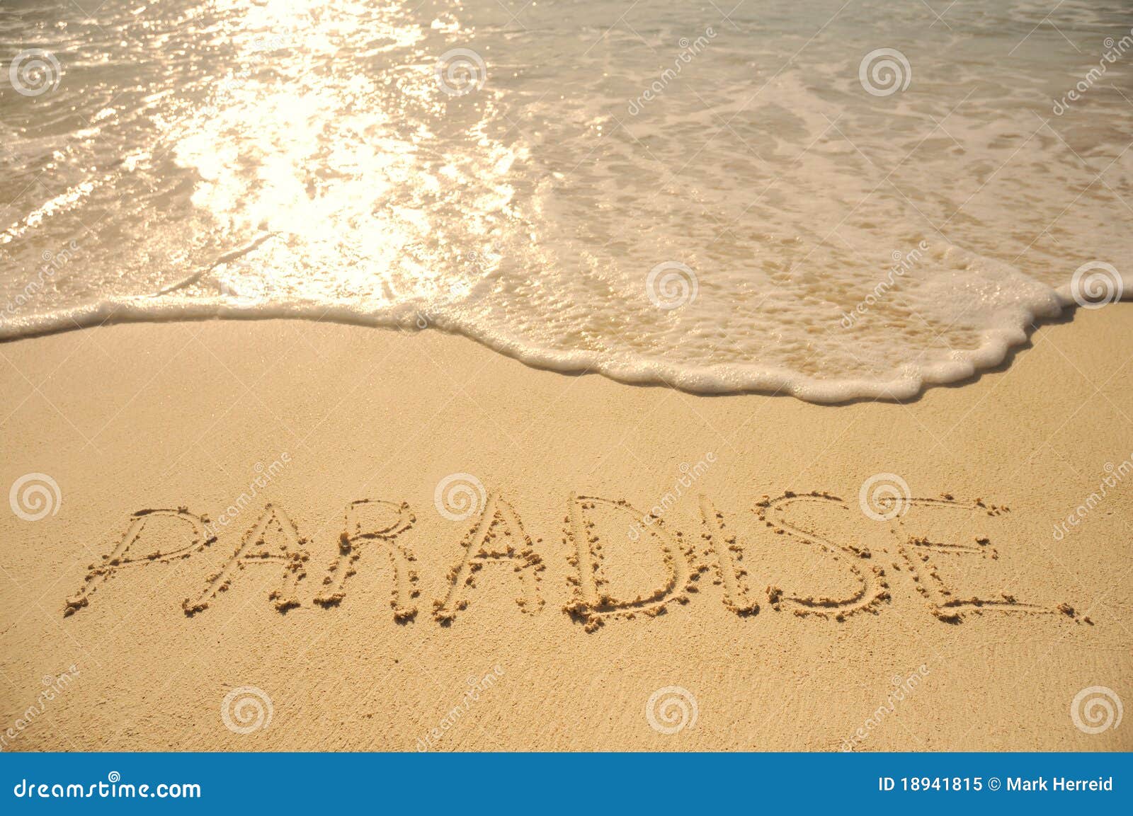 Paradise Written in Sand on Beach Stock Image - Image of coast, message ...