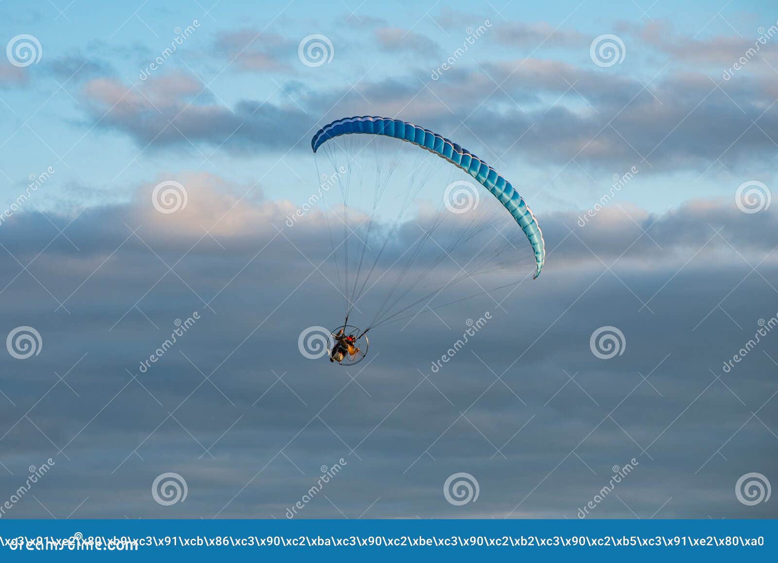 Paraglide with a Motor High in the Sky Stock Photo - Image of ...
