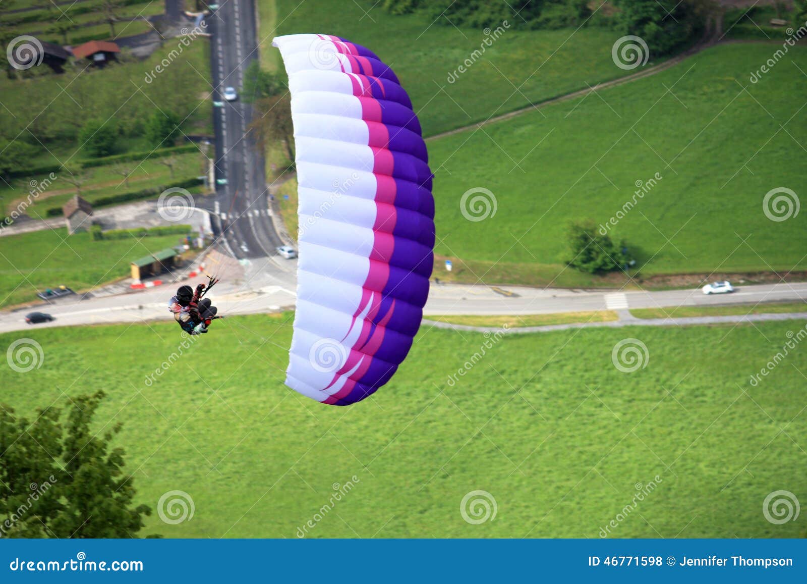 Paraglider in the Alps stock photo. Image of road, blue - 46771598