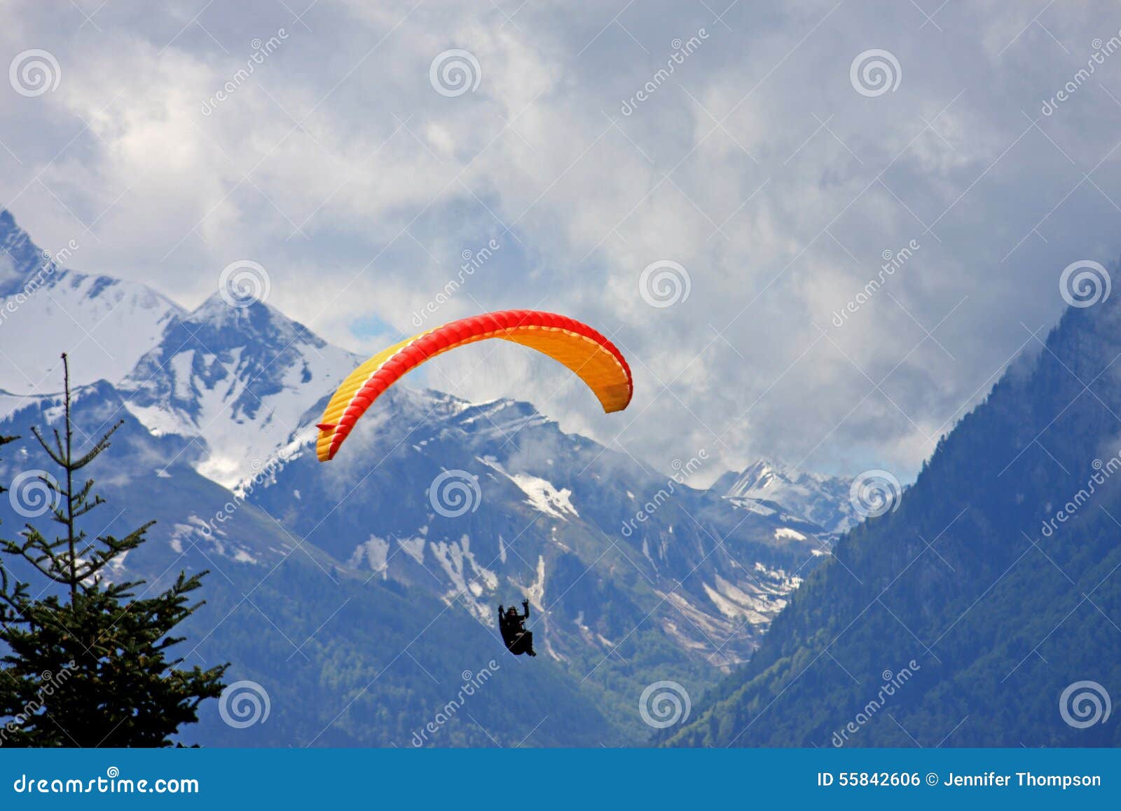 Paraglider in the Alps stock photo. Image of hill, kite - 55842606