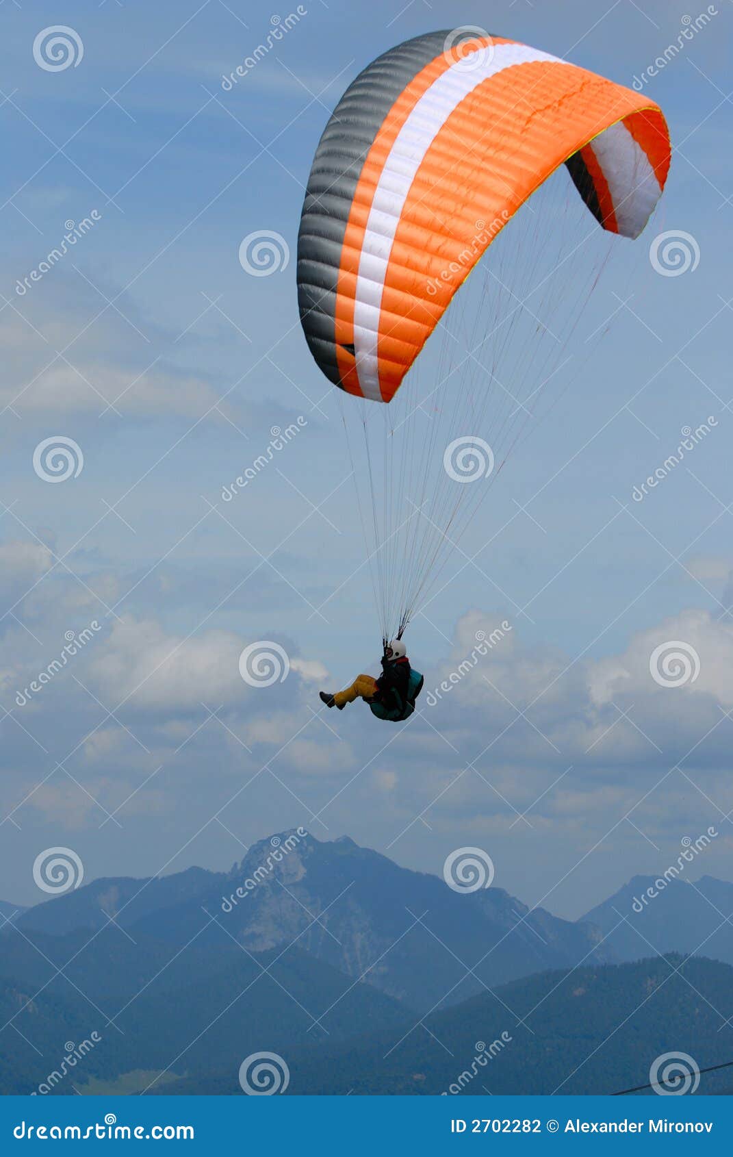 Paraglider in the Alps sky stock photo. Image of finned - 2702282
