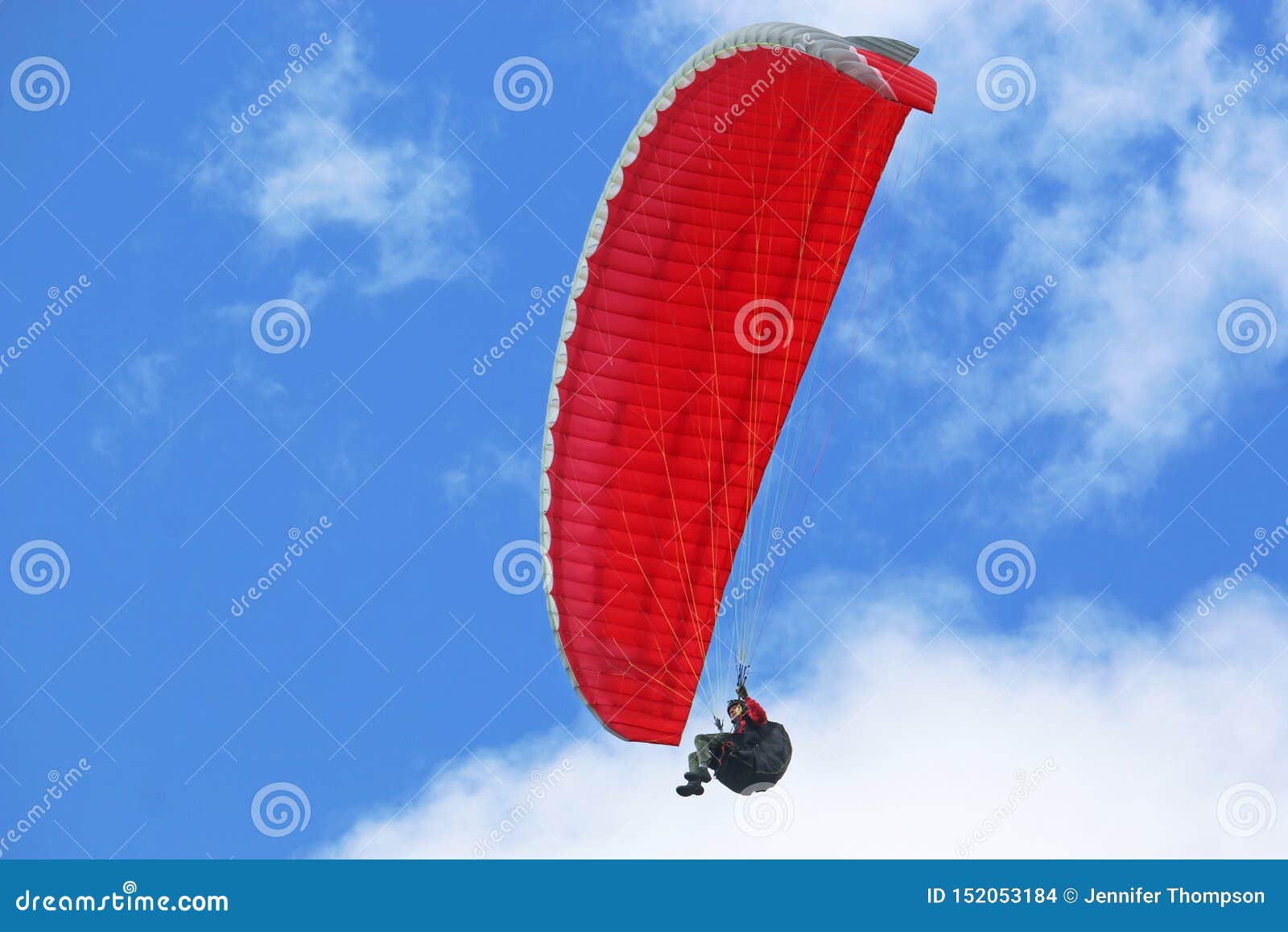 Red Paraglider in a Blue Sky Stock Photo - Image of harness, flying ...