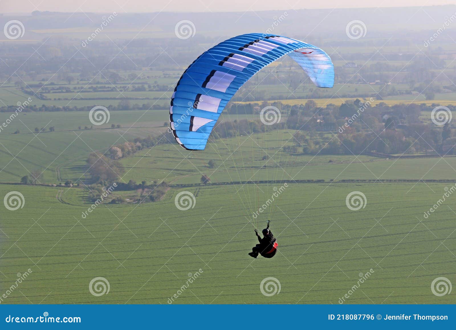 Paraglider Flying at Milk Hill, Wiltshire Editorial Photo - Image of ...